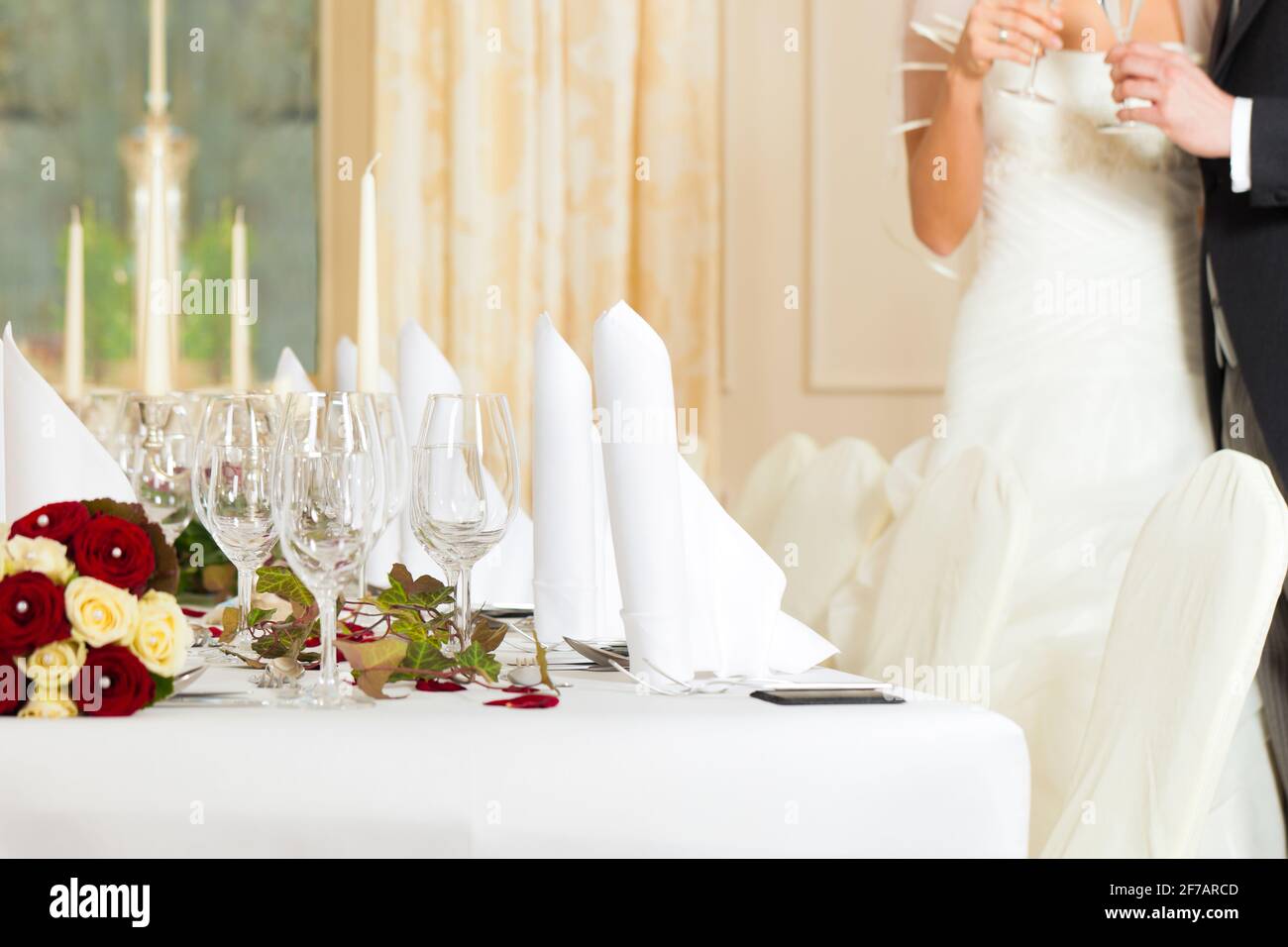 Wedding table at a wedding feast decorated with bridal bouquet Stock ...