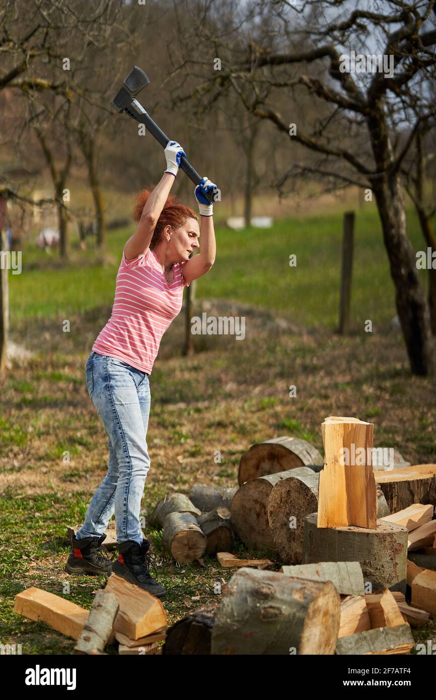 Woman logger axe hi-res stock photography and images - Alamy