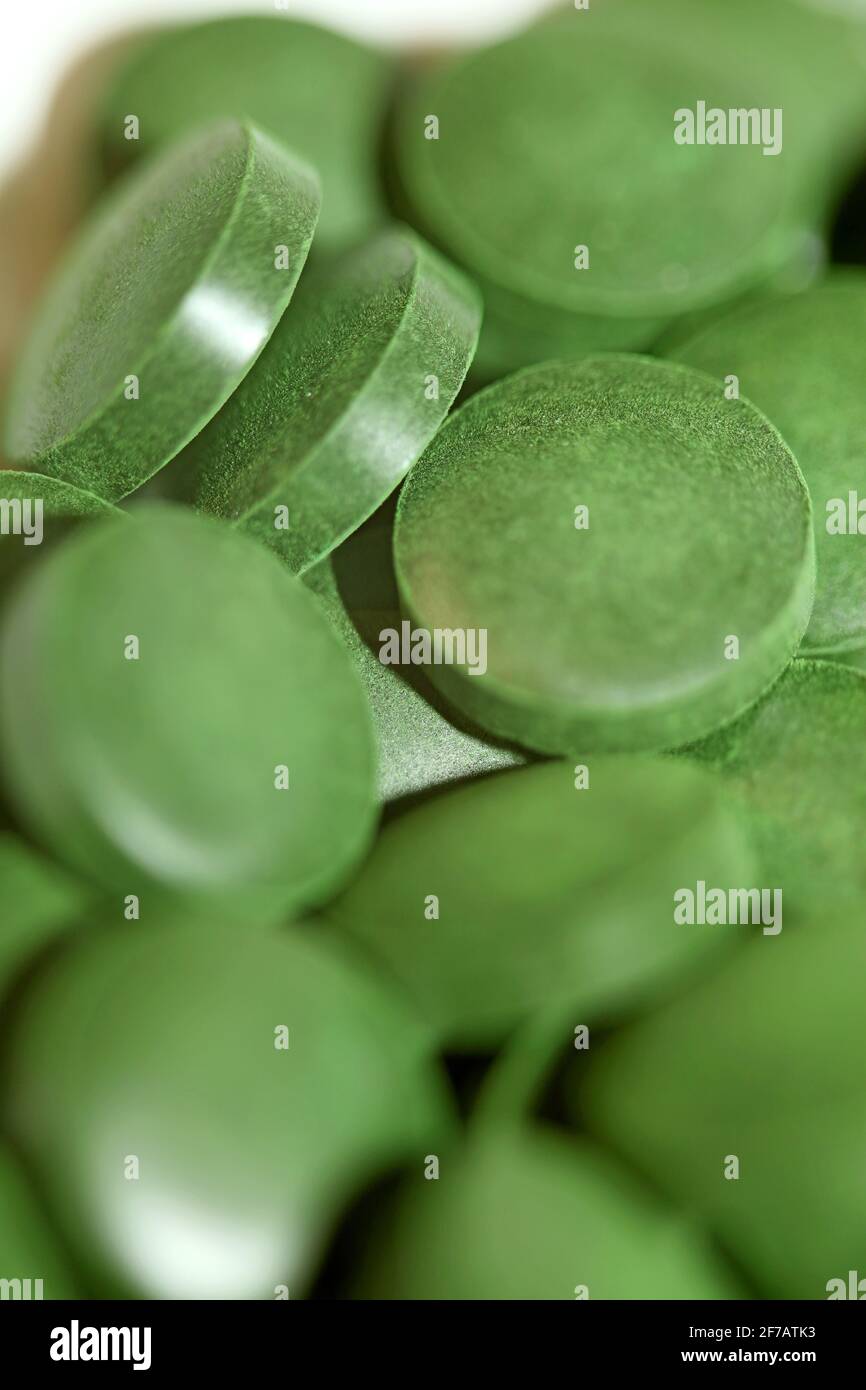 Green pills close up medical spirulina platensis algae family ...