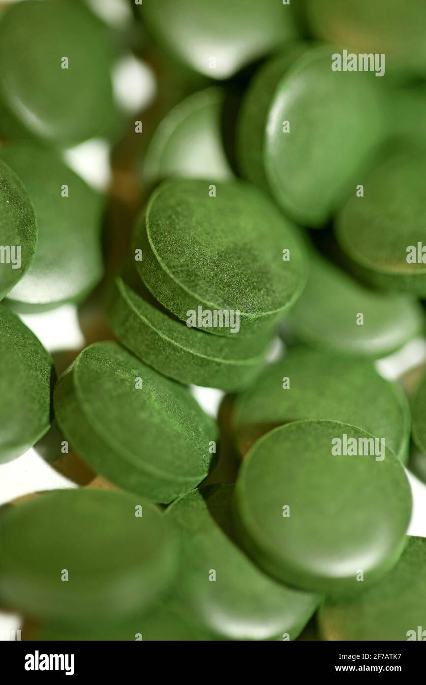 Green pills close up medical spirulina platensis algae family ...