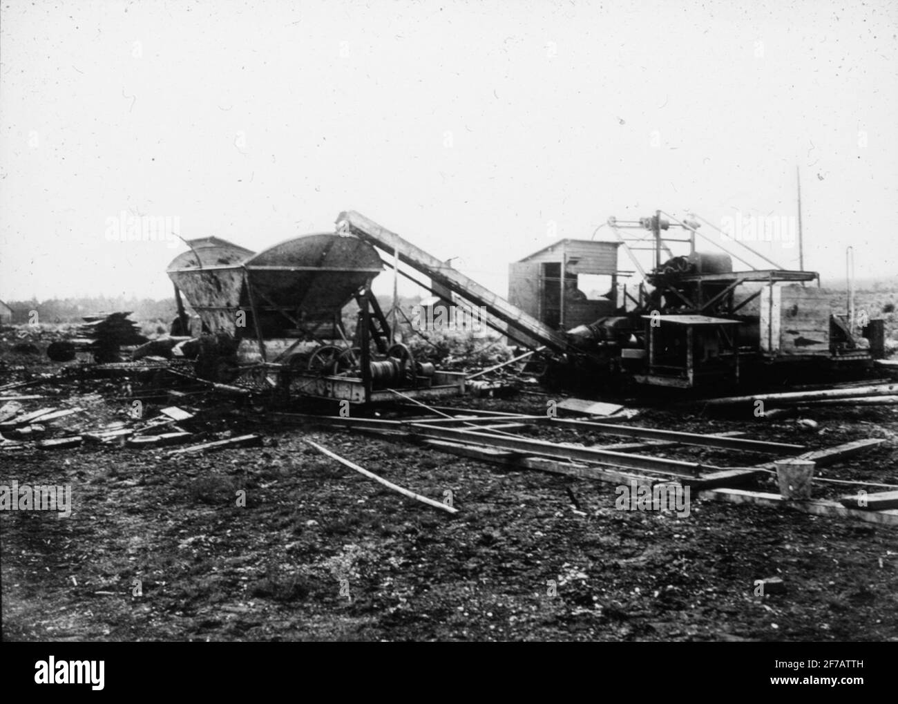 Skiopticone image. Peat preparation. Peat uptake machine Stock Photo ...