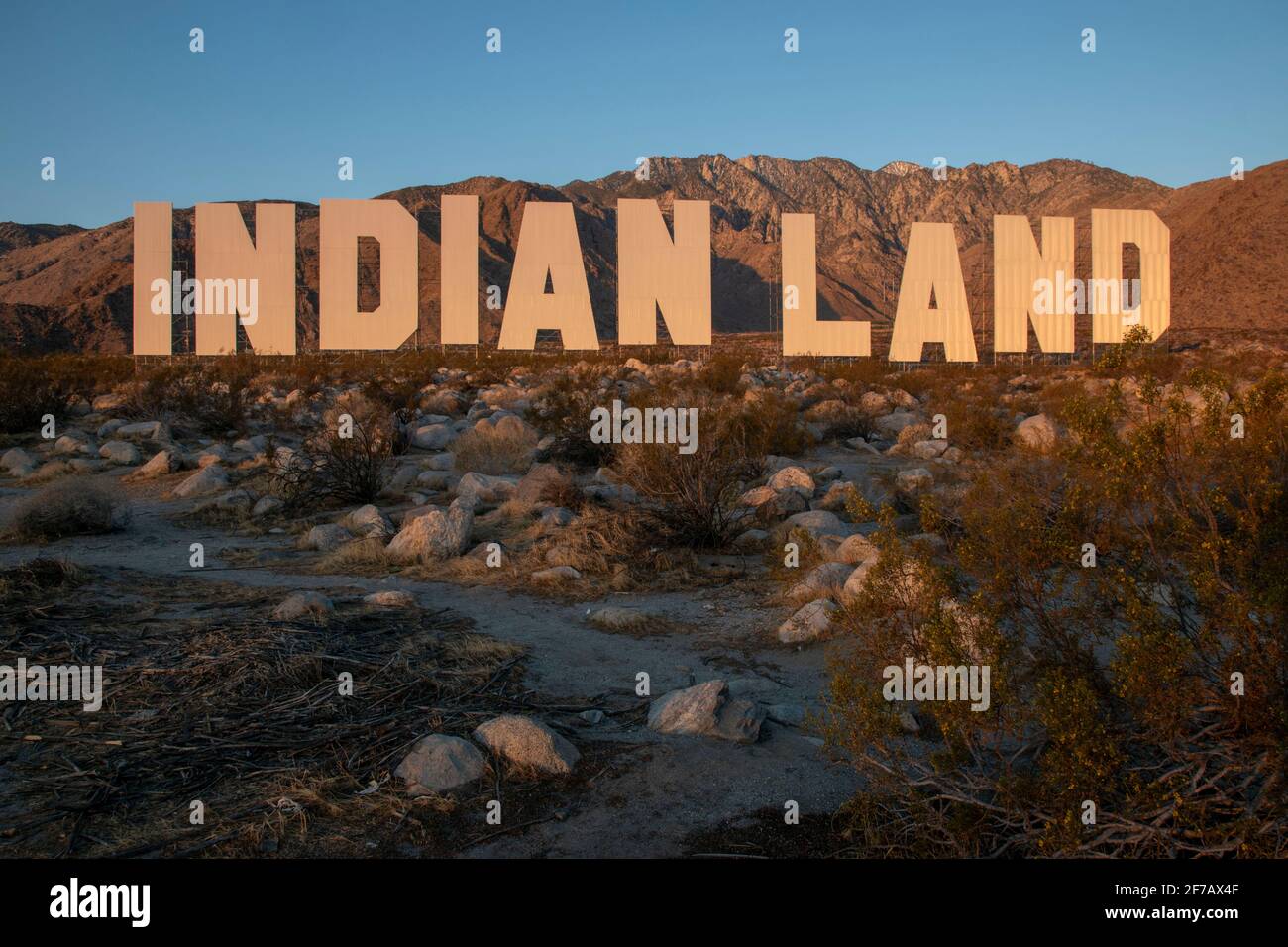 This Indian Land sign sits close to Palm Springs, CA, USA and looks ...