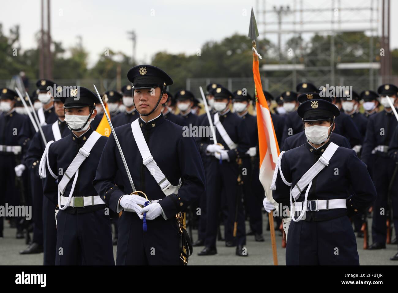 Students of the National Defense Academy perform a military parade to ...