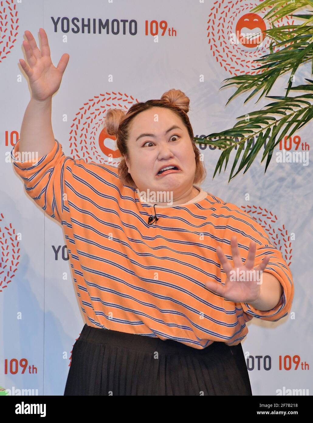 Yui P(Yui Fujino) of Okazu Club poses for photographers during a press ...