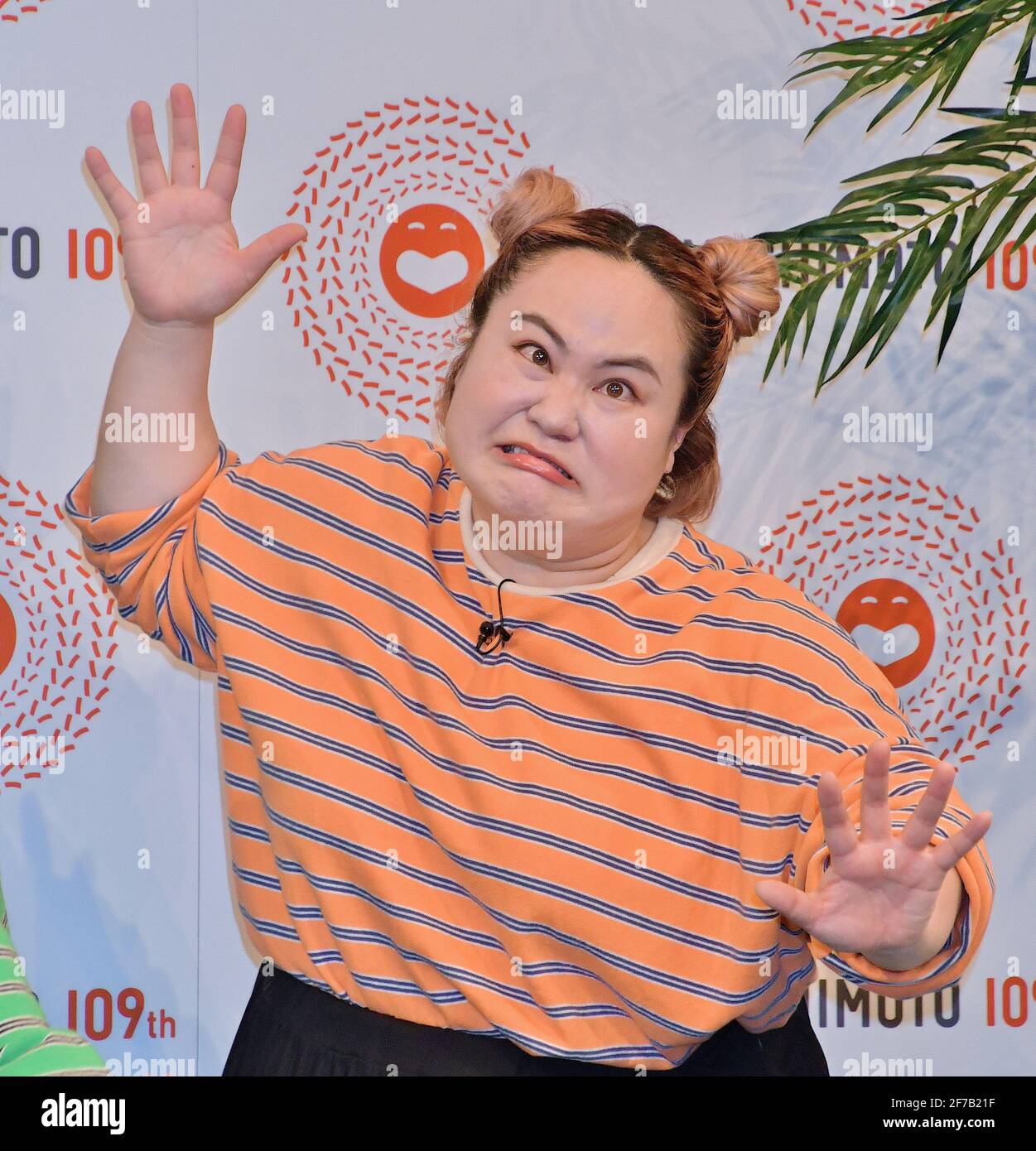 Yui P(Yui Fujino) of Okazu Club poses for photographers during a press ...
