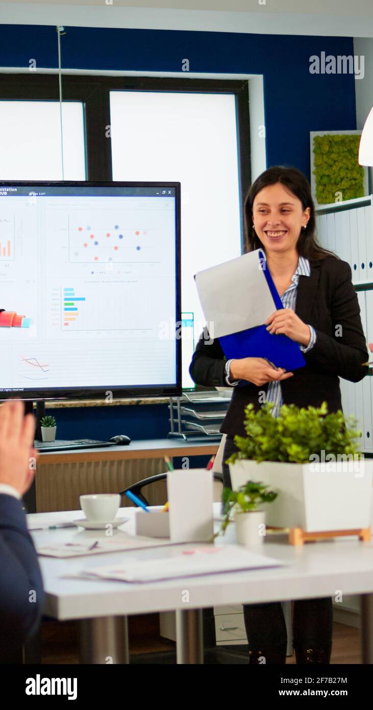Business audience applauding woman leader manager thank for conference ...