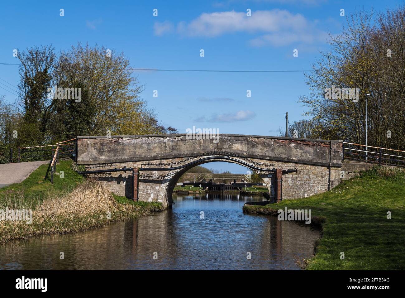 Looking under a road bridge towards a lock on the Rufford branch the ...