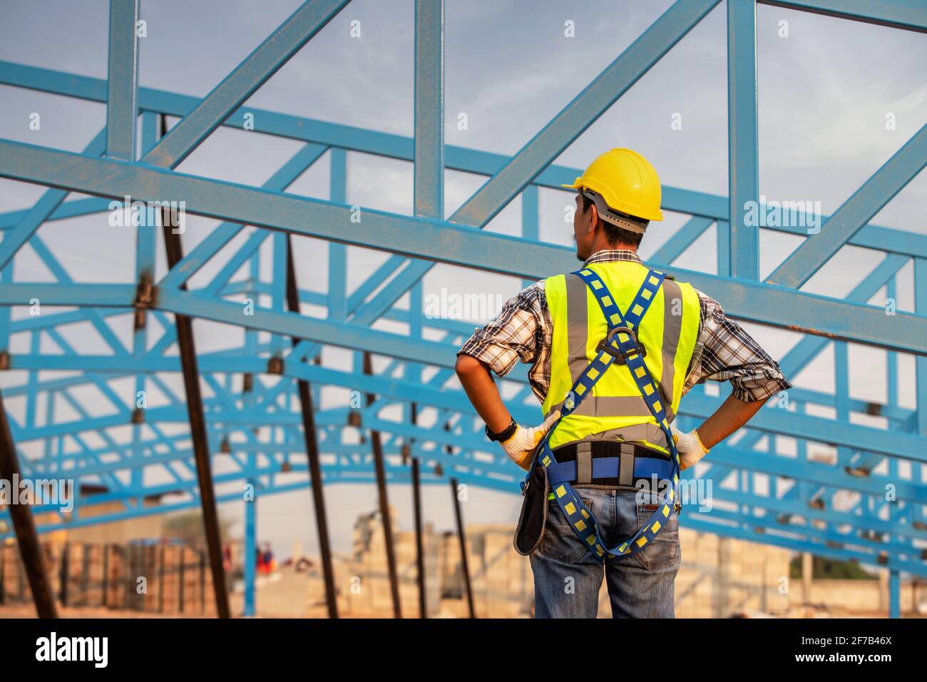 Engineer technician watching warehouse steel roof structure , Engineer ...