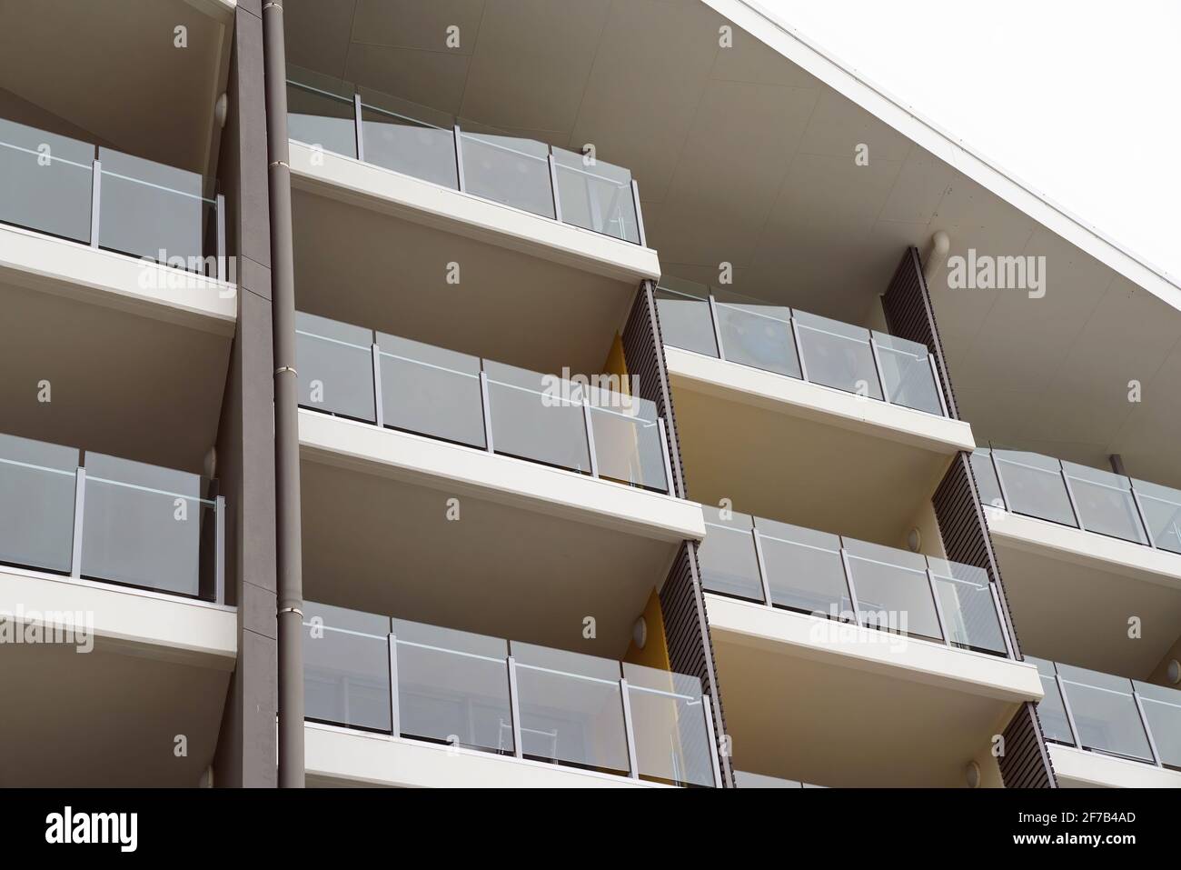 The balconies of a tourist hotel apartment building Stock Photo - Alamy