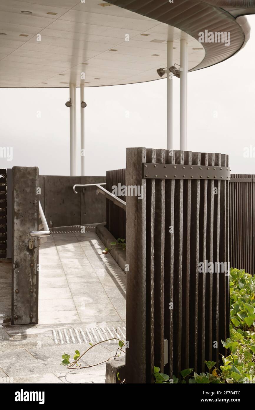 Close up of the curved architectural design of timber posts on an ...