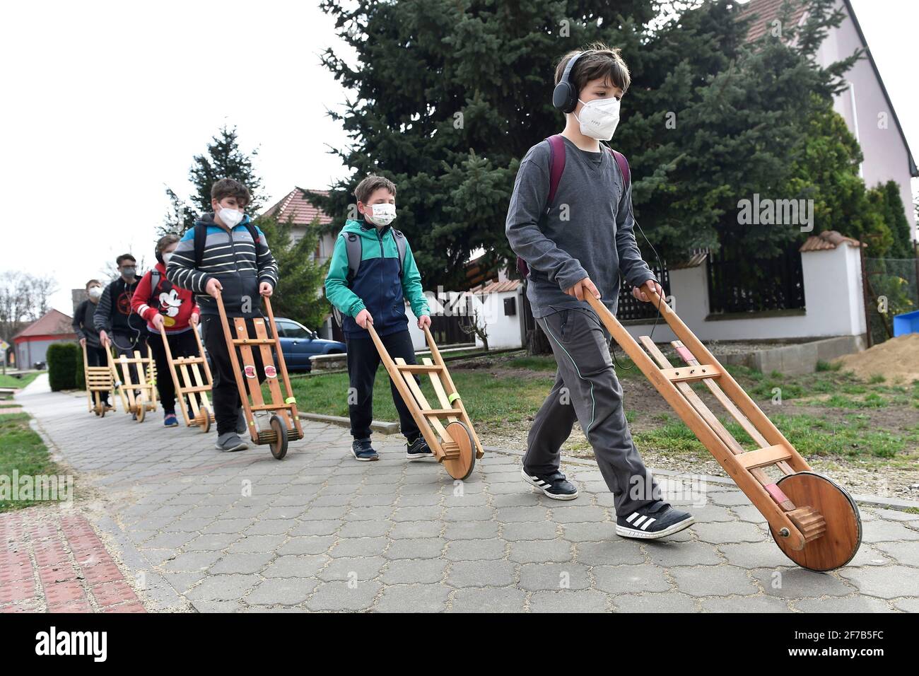 Branisovice, Czech Republic. 02nd Apr, 2021. Children walk with their ...