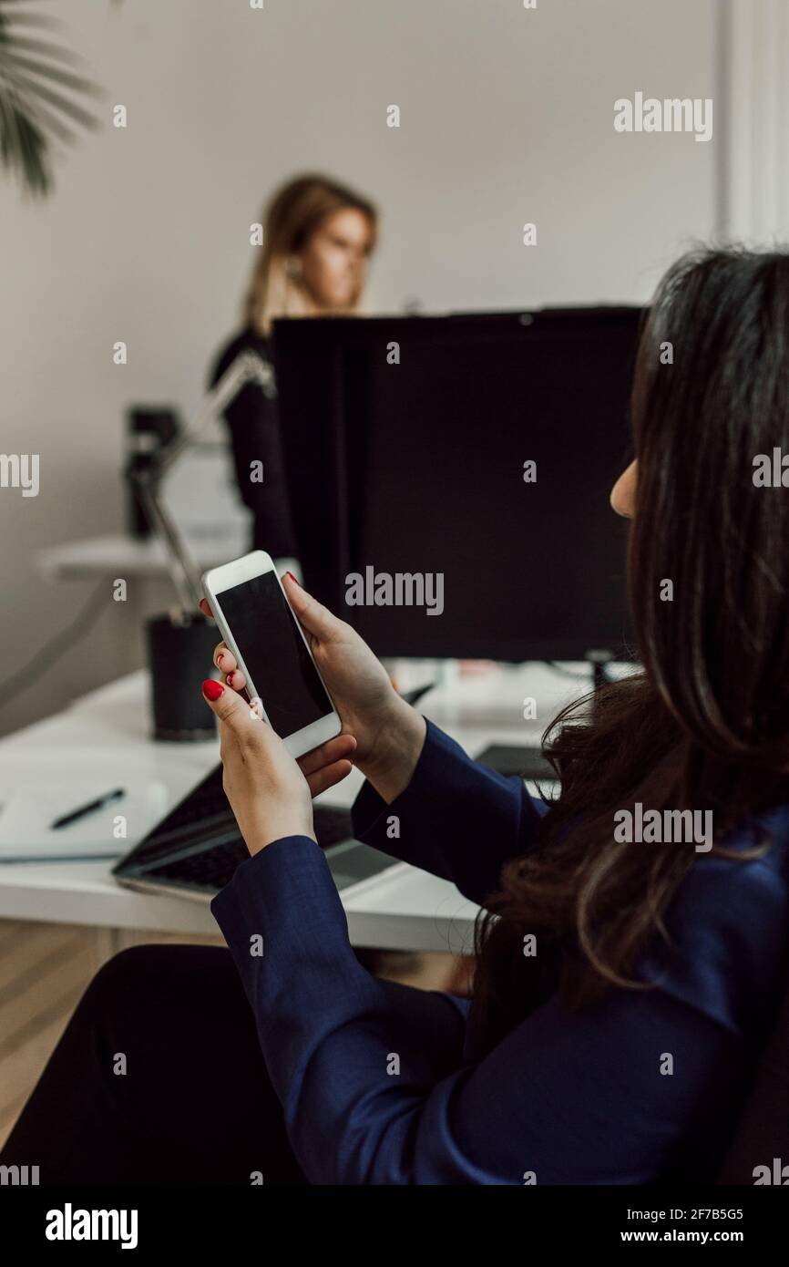 Woman working desk using telephone hi-res stock photography and images ...