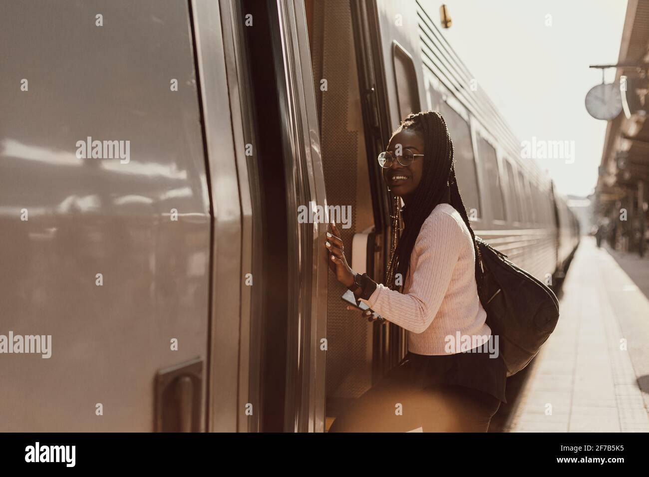 People person entering train hi-res stock photography and images - Alamy