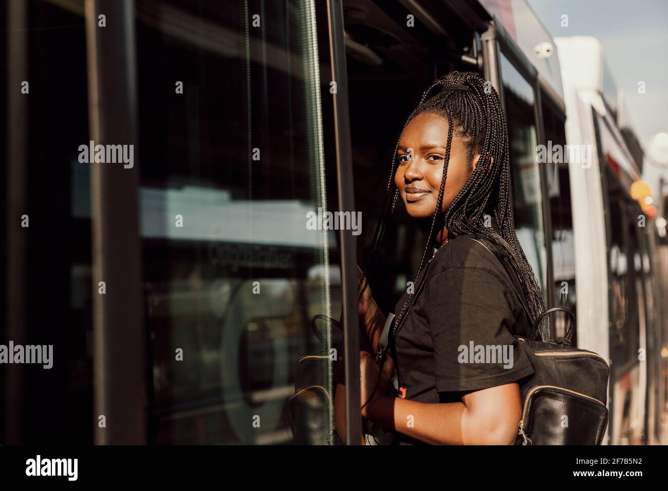 Woman standing up, bus hi-res stock photography and images - Alamy