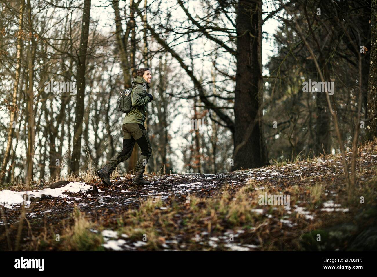 Man walking into forest hi-res stock photography and images - Alamy
