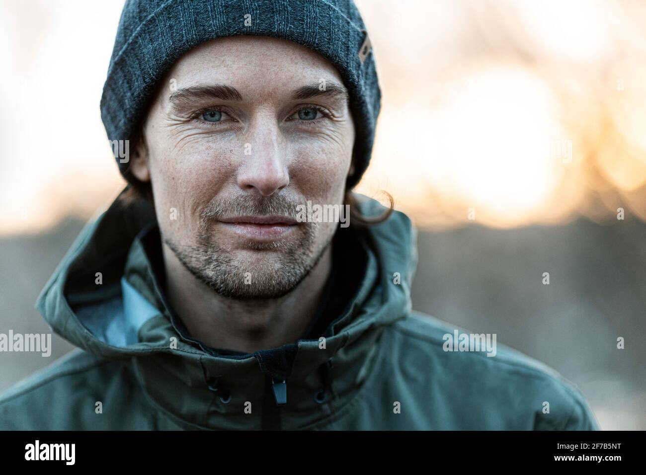 Portrait of man looking at camera Stock Photo - Alamy