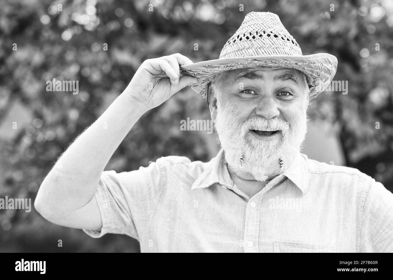 Used to be cowboy. Man unshaven smiling face. Farm concept. Living in ...