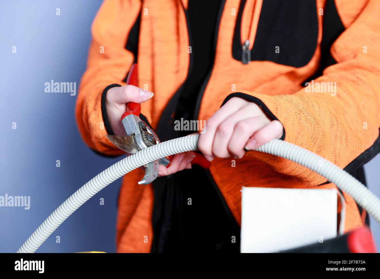 Hand holding pipe hi-res stock photography and images - Alamy