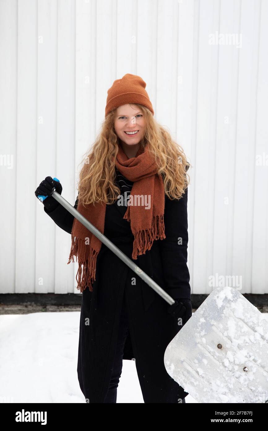 Woman Shoveling Snow High Resolution Stock Photography and Images - Alamy