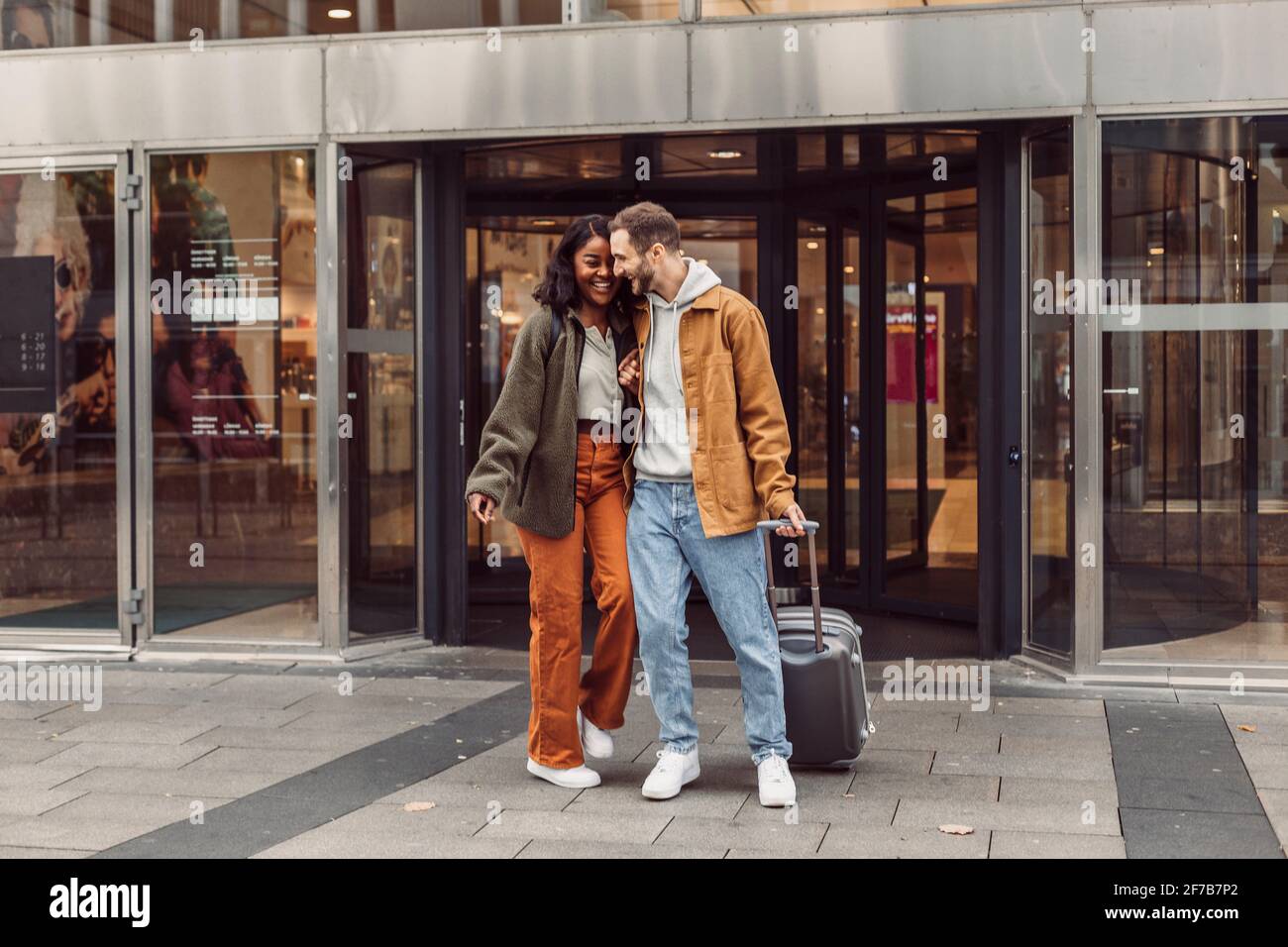 Happy couple standing together Stock Photo - Alamy