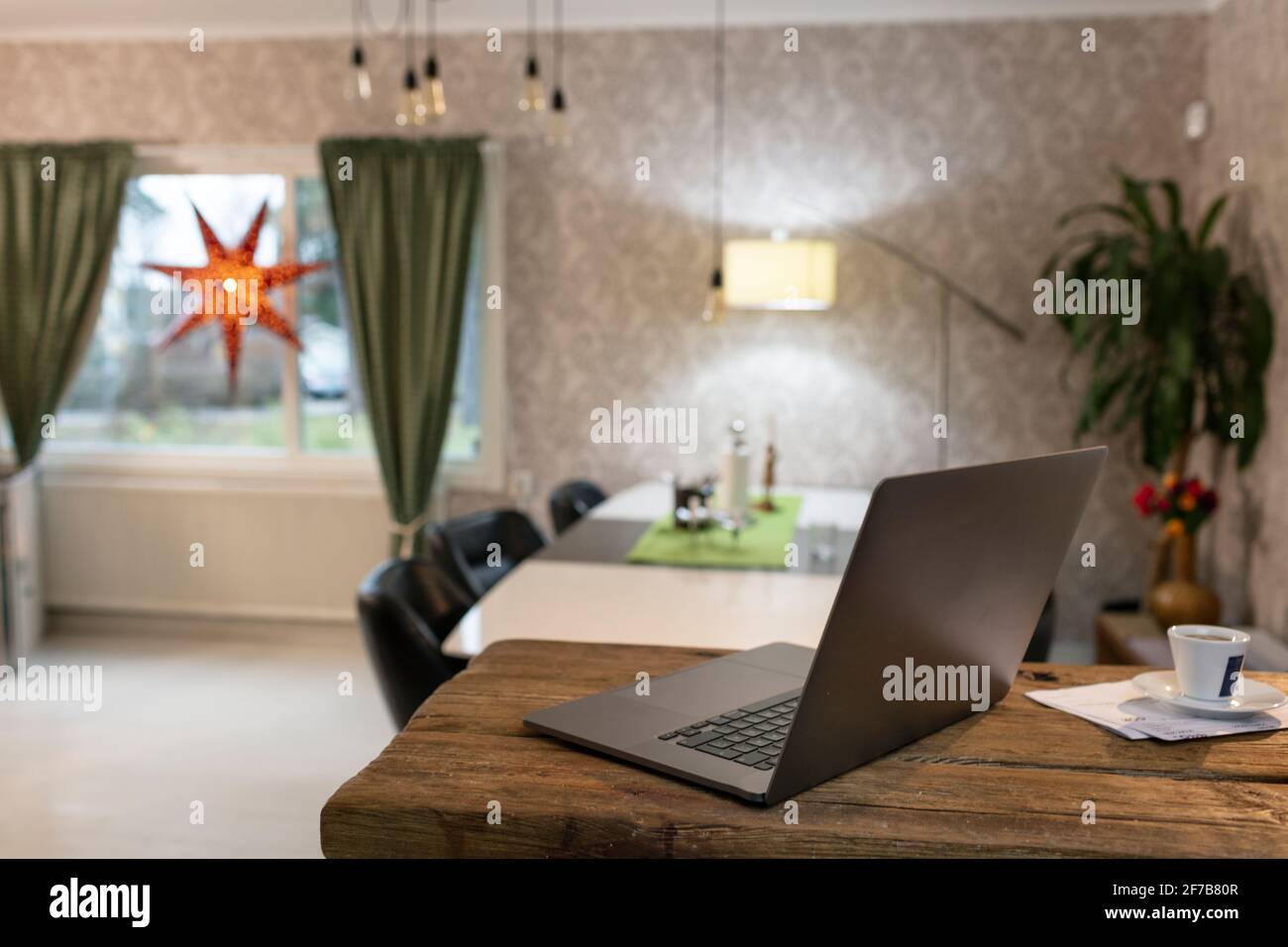 Laptop on table Stock Photo - Alamy