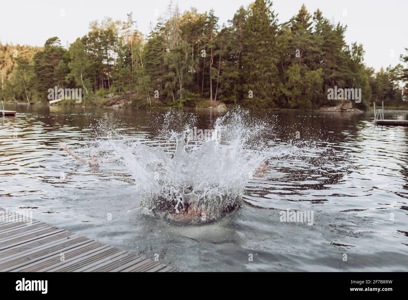 Splash in lake Stock Photo - Alamy
