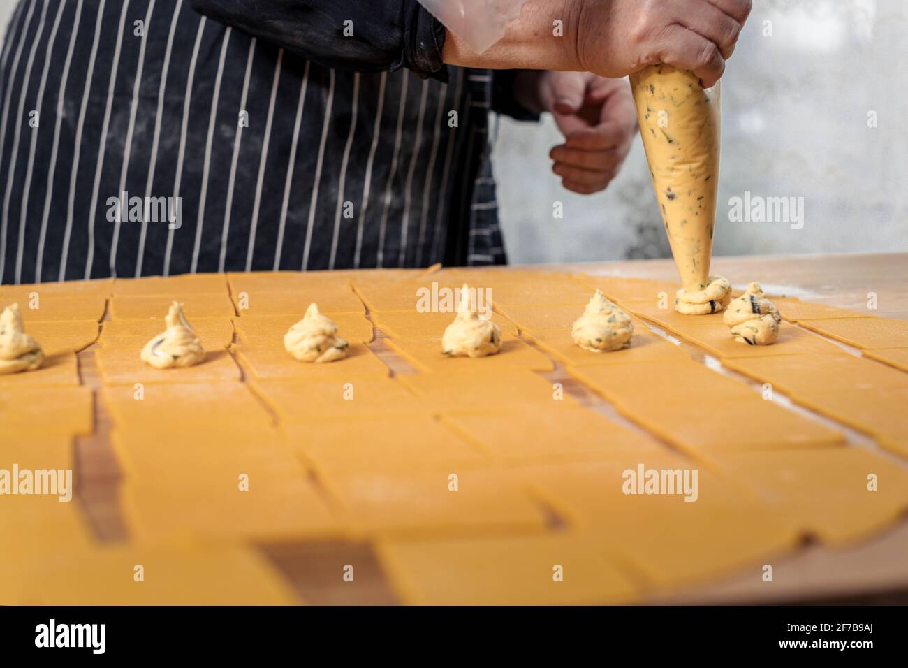 Filling pasta dough Stock Photo - Alamy