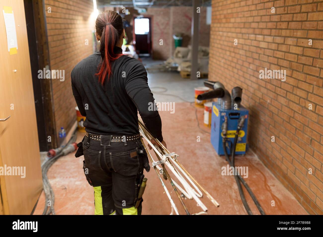 Woman renovating house Stock Photo - Alamy