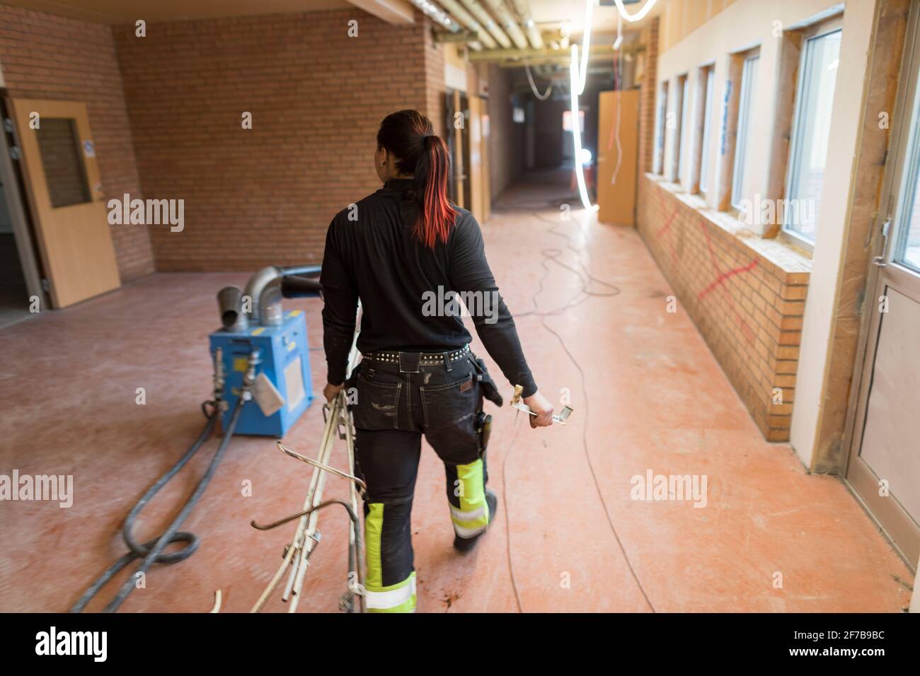 Woman renovating house Stock Photo - Alamy