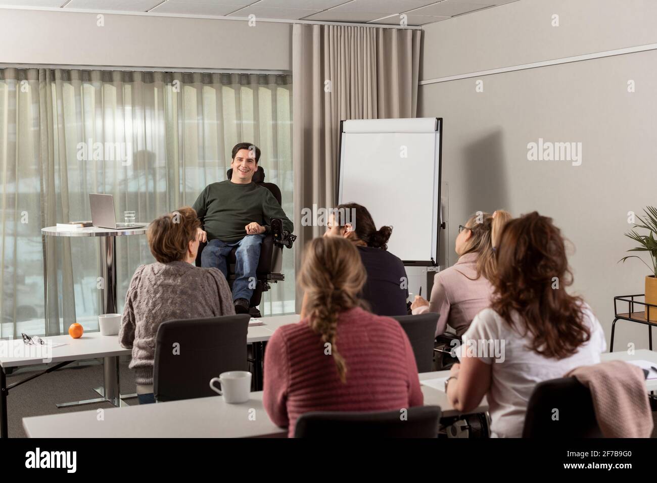 Man having presentation at seminar Stock Photo - Alamy