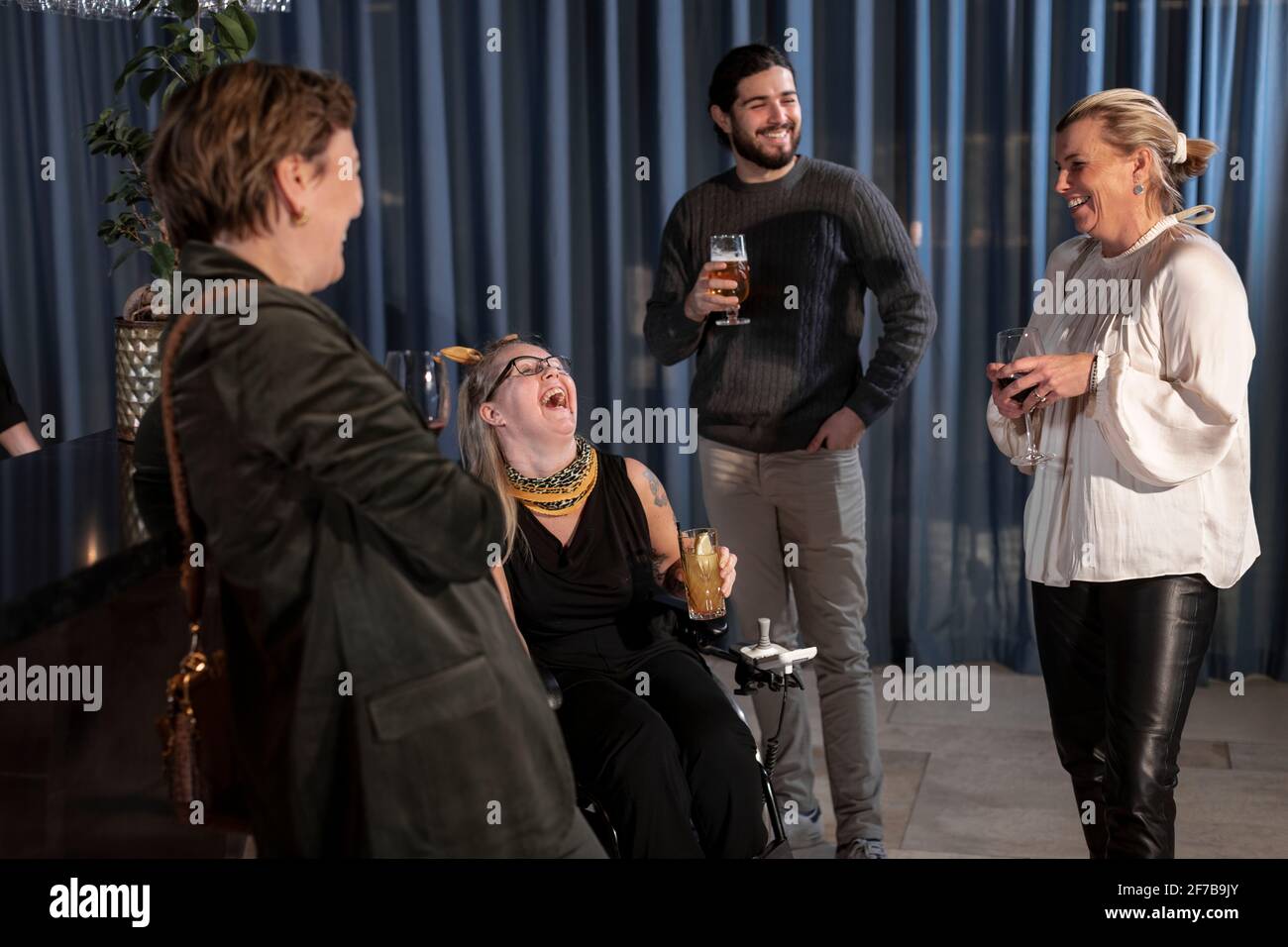 Group of friends having drink in bar Stock Photo - Alamy