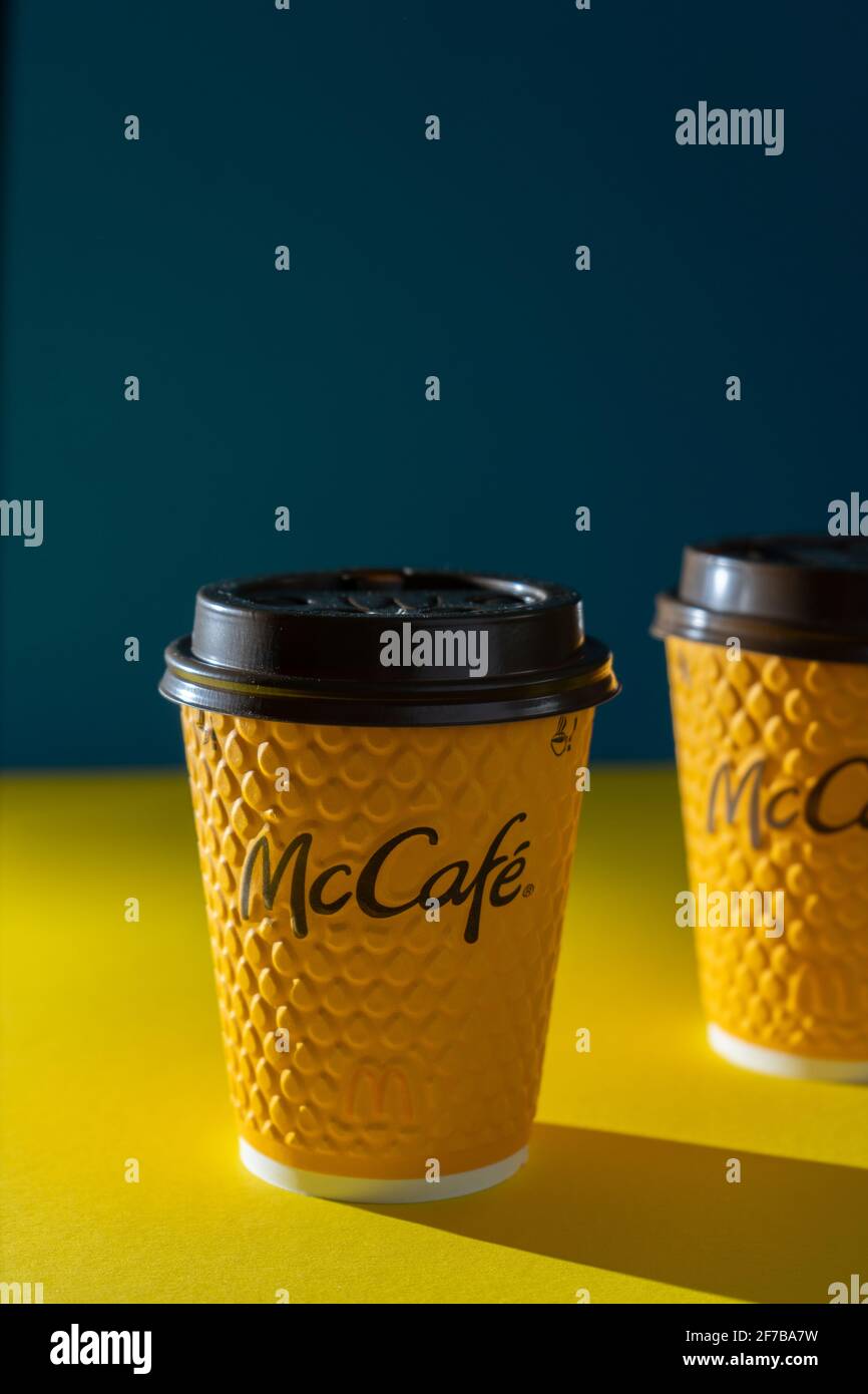 Ukraine, Kyiv - February 17, 2021: Yellow glass of coffee from McDonald ...