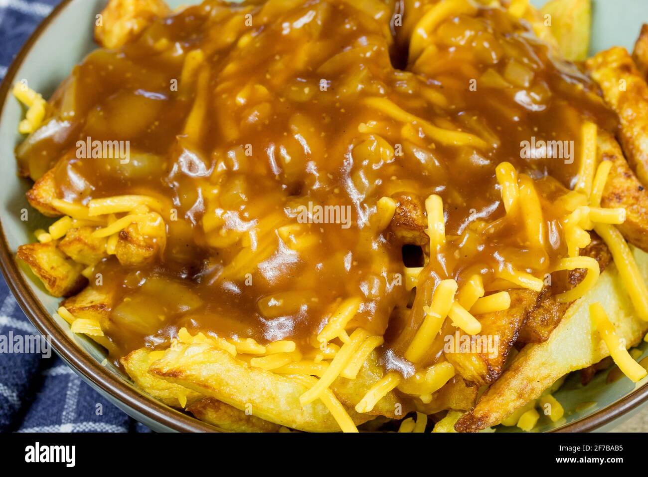 Poutine on plate hi-res stock photography and images - Alamy