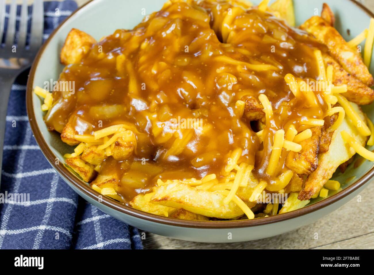 Poutine on plate hi-res stock photography and images - Alamy