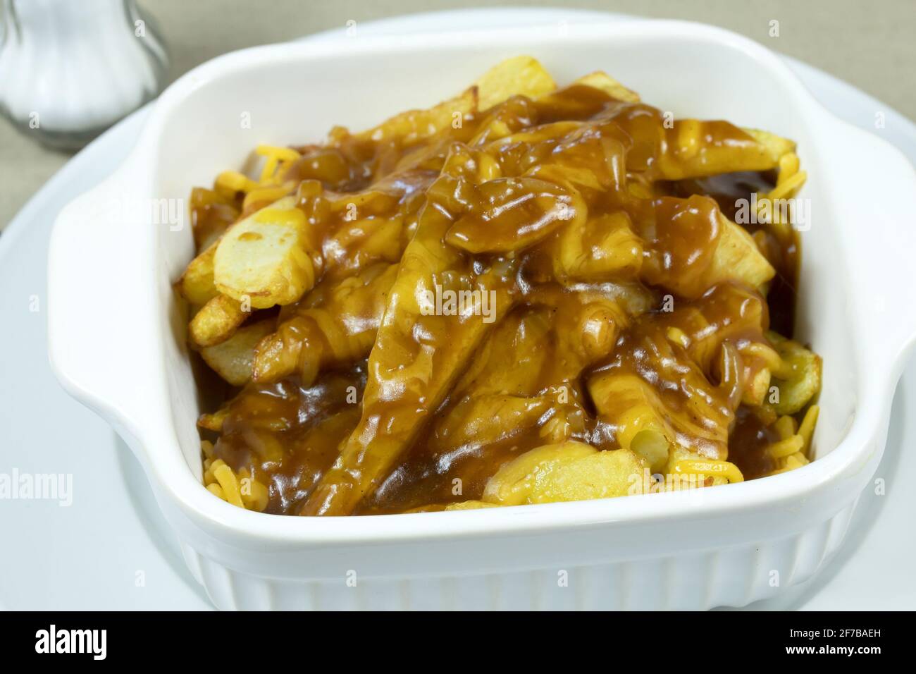 Poutine on plate hi-res stock photography and images - Alamy