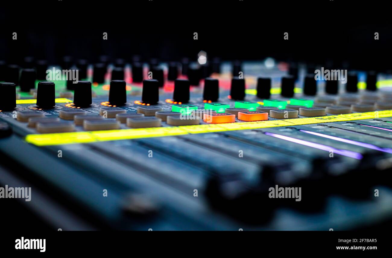 Close up of Sliders and buttons on Audio Mixing Desk at live event ...