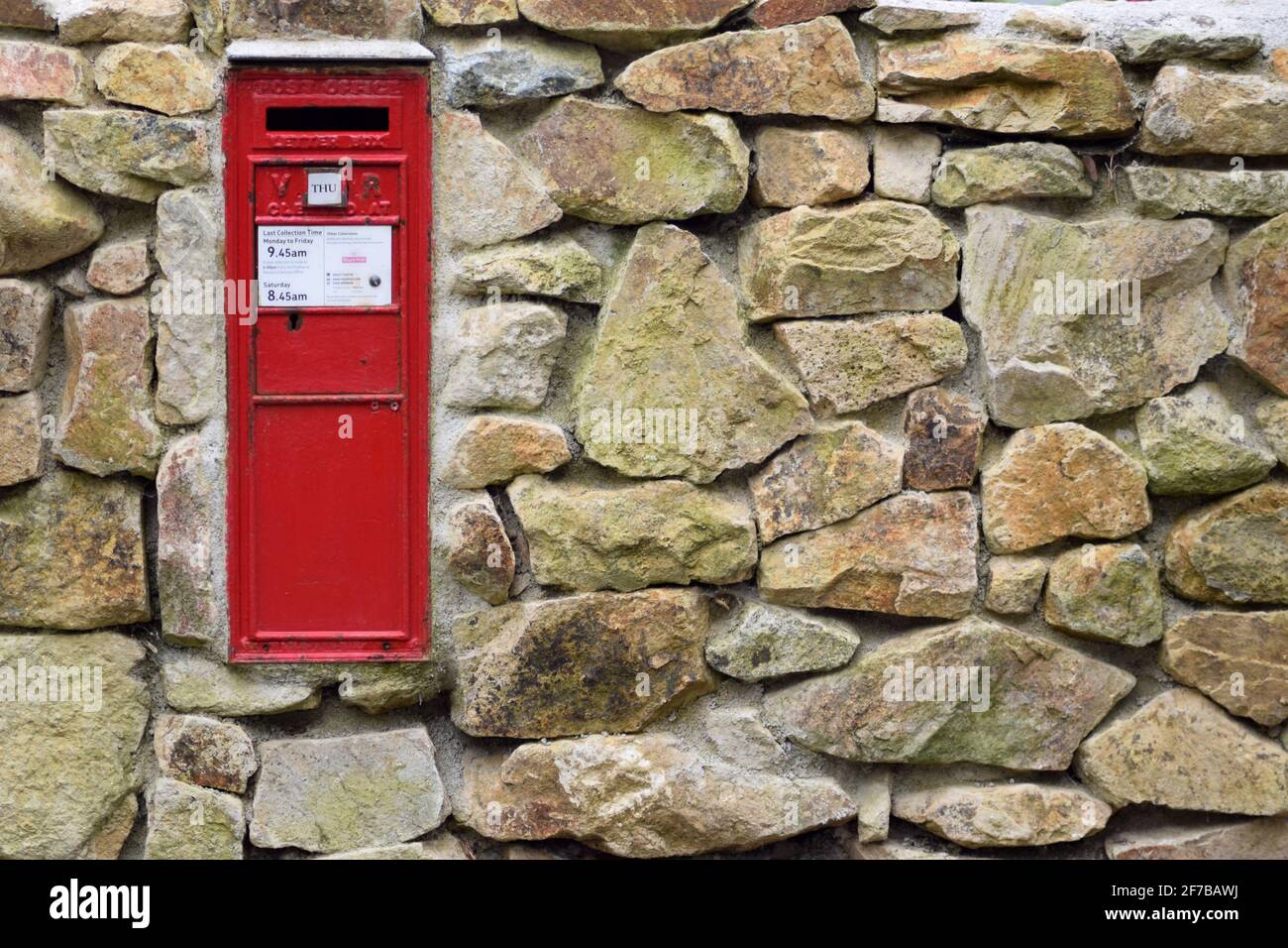 Backdrop of post box and stone wall hi-res stock photography and images ...