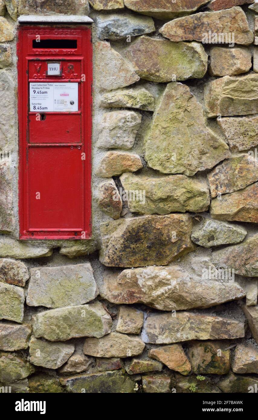 Post Box & Stone Wall portrait Stock Photo - Alamy