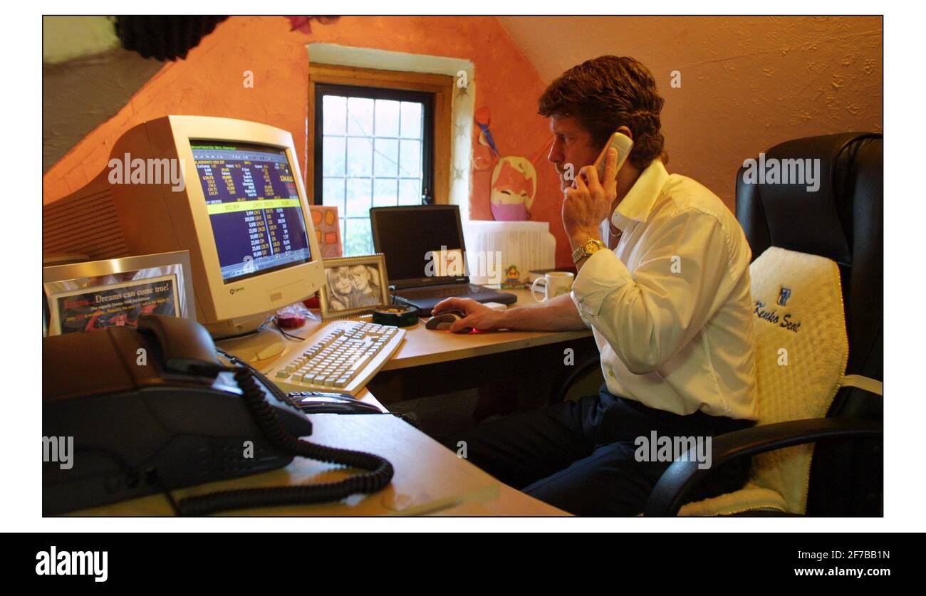 Mitch Mosley trades on his computer from his home in Oxted.pic David ...