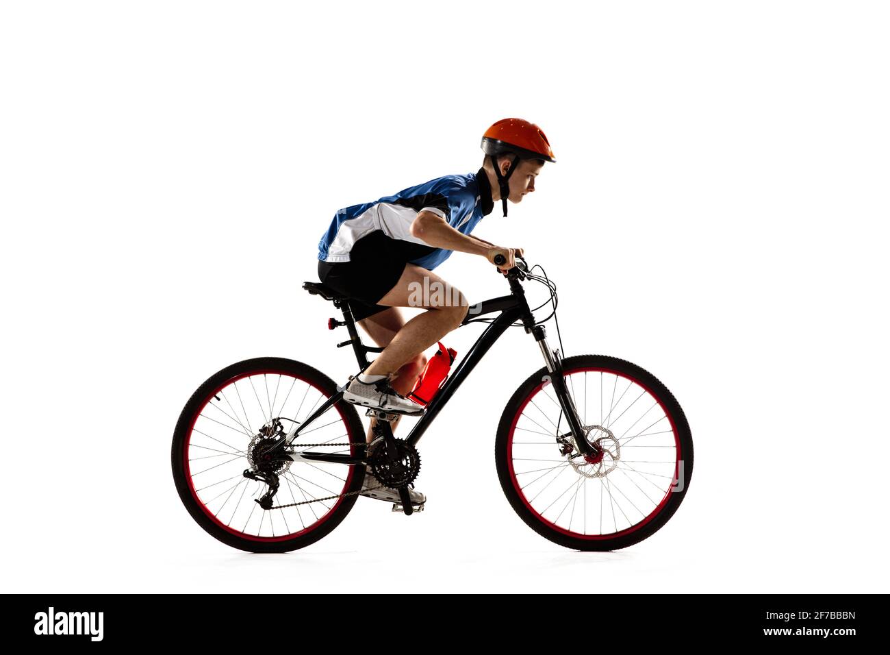Young Caucasian boy bike rider with road bike isolated over white ...