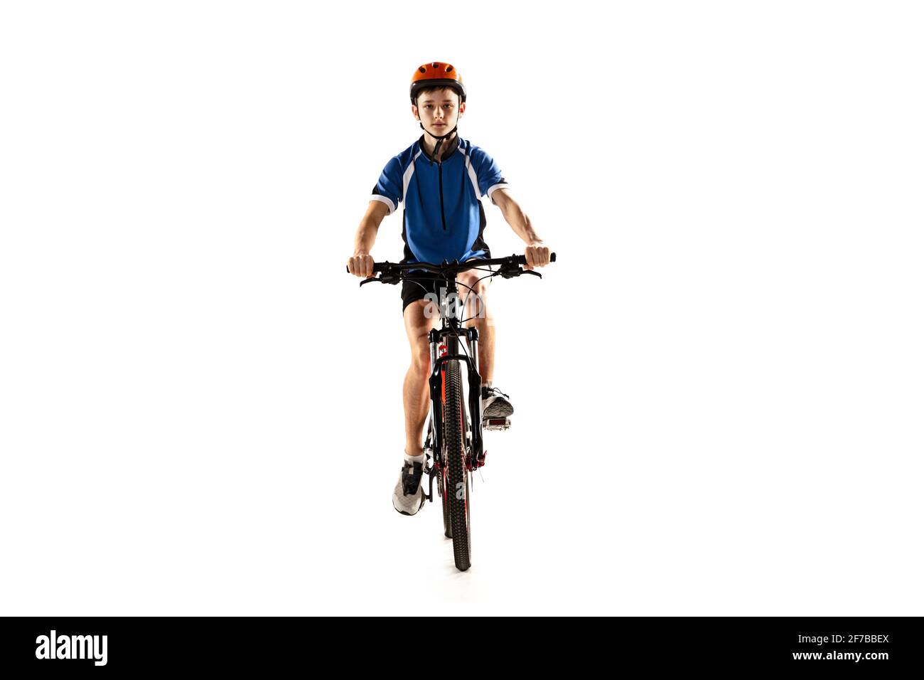 Young Caucasian boy bike rider with road bike isolated over white ...