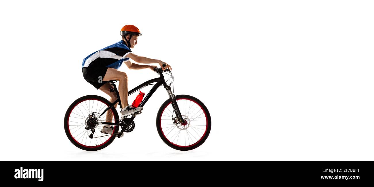 Young Caucasian boy bike rider with road bike isolated over white ...
