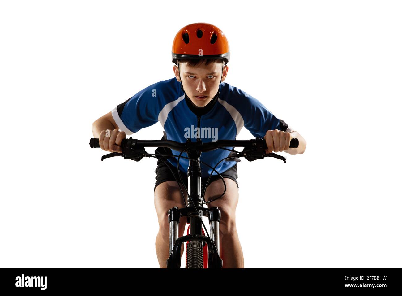 Young Caucasian boy bike rider on road bike isolated over white ...
