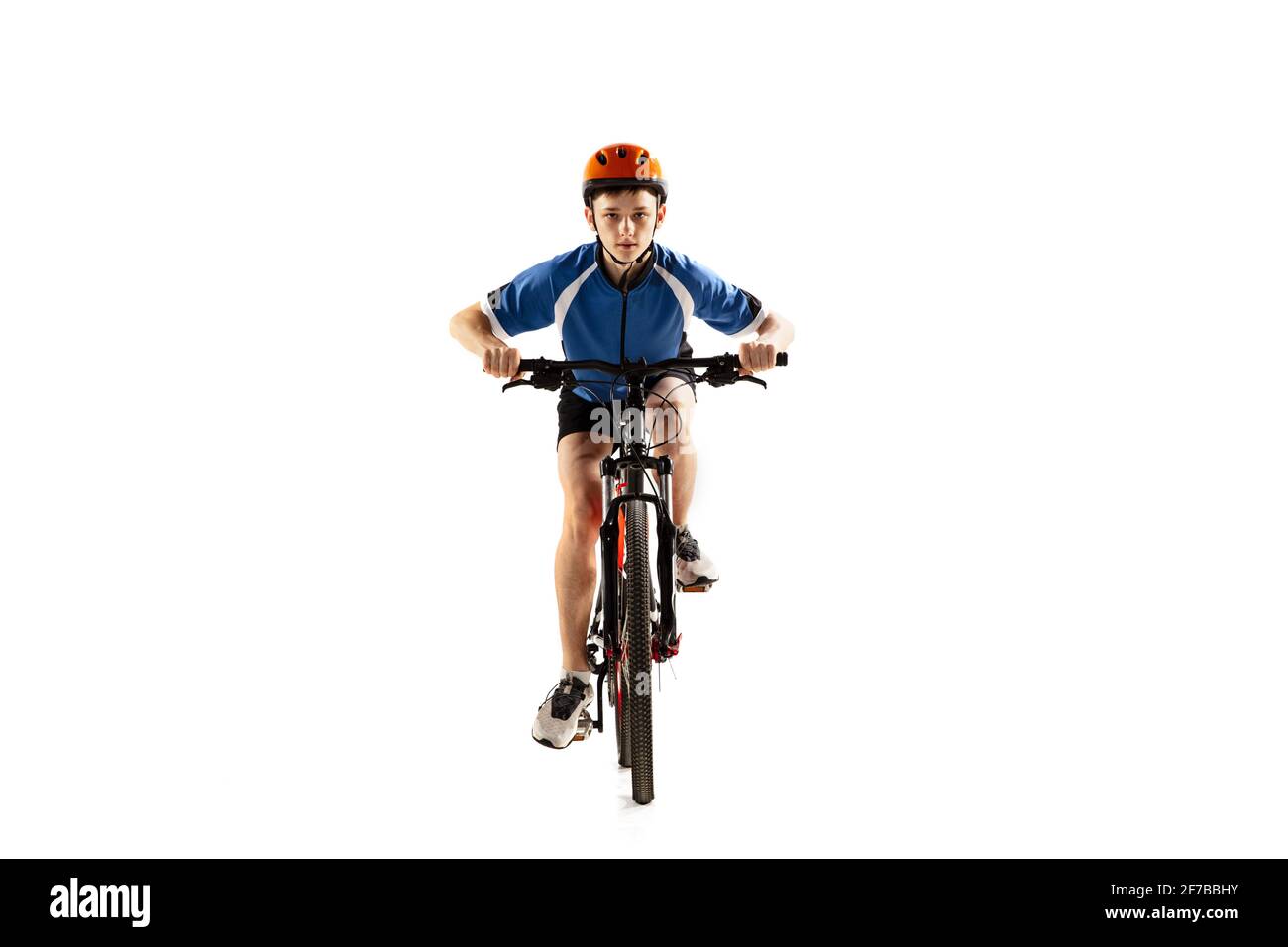 Young Caucasian boy bike rider with road bike isolated over white ...