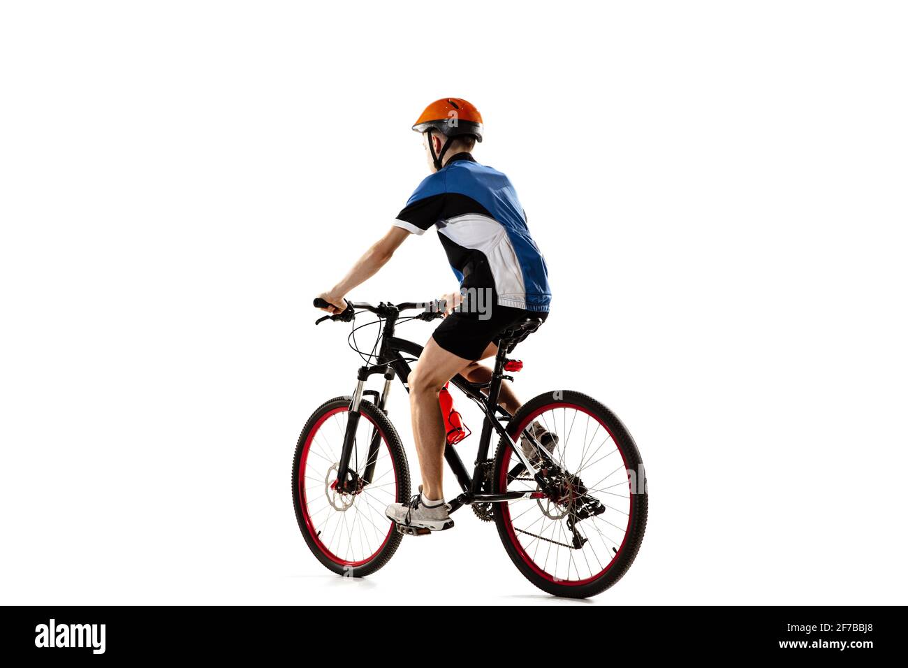 Young Caucasian boy bike rider with road bike isolated over white ...