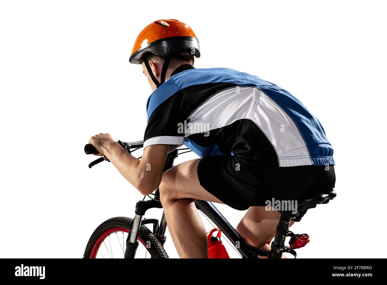 Young Caucasian boy bike rider with road bike isolated over white ...