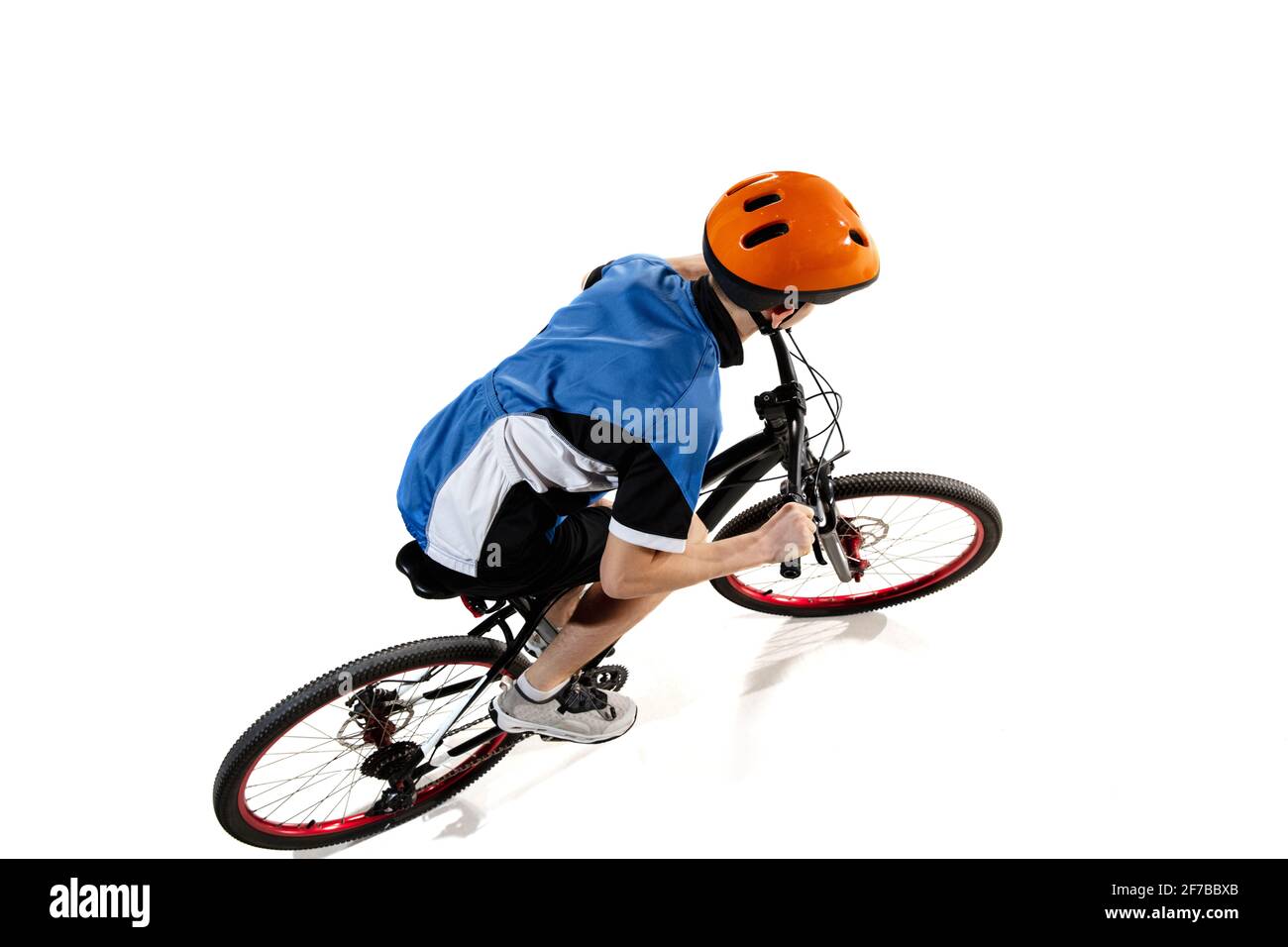 Young Caucasian boy bike rider on road bike isolated over white ...