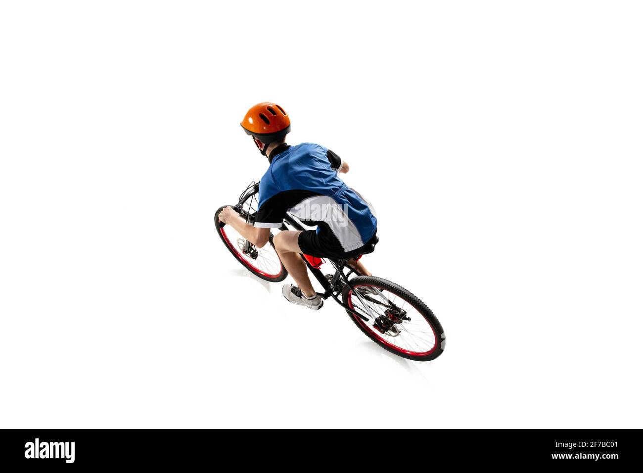 Young Caucasian boy bike rider on road bike isolated over white ...
