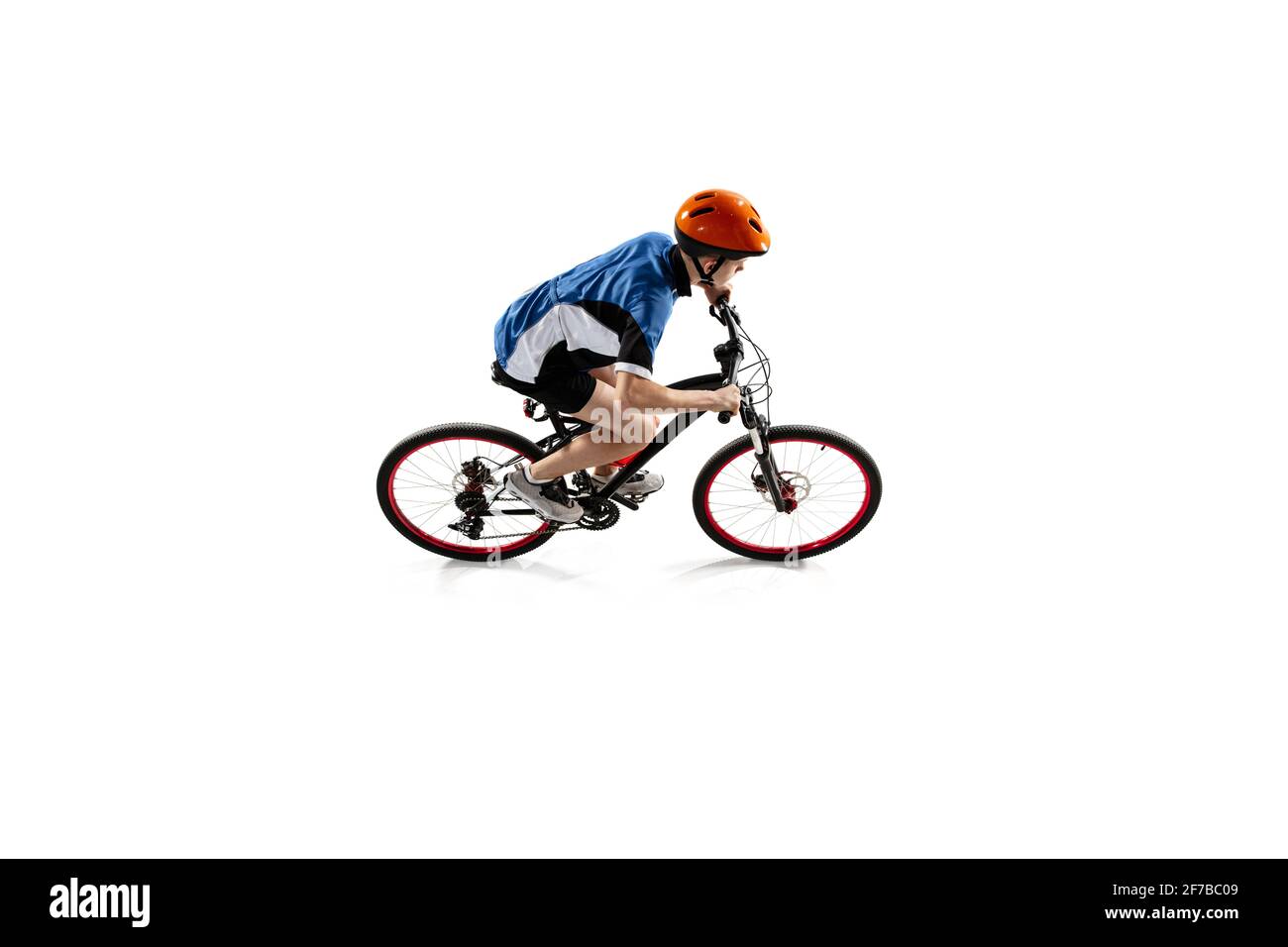 Young Caucasian boy bike rider on road bike isolated over white ...