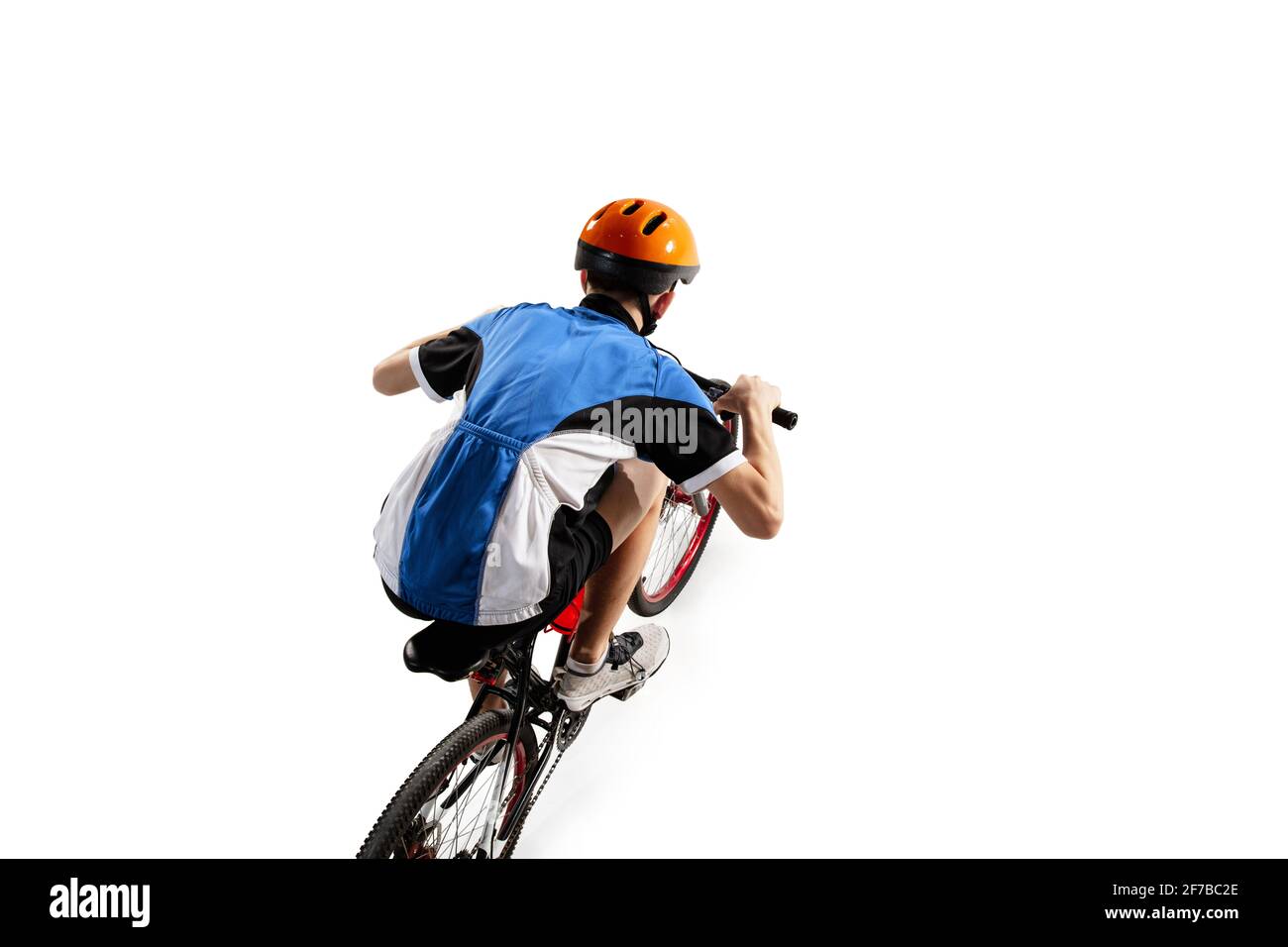 Young Caucasian boy bike rider with road bike isolated over white ...